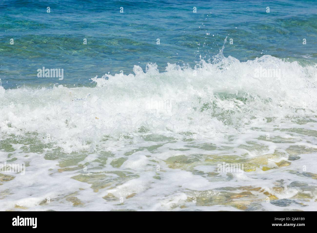 Sea wave close-up. Splashes of water on the sea surface. Summer ...