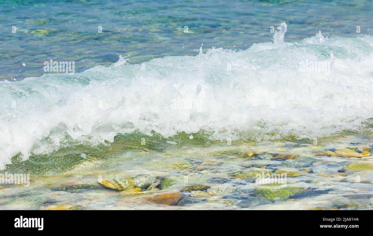 Sea wave close-up. Splashes of water on the sea surface. Summer ...