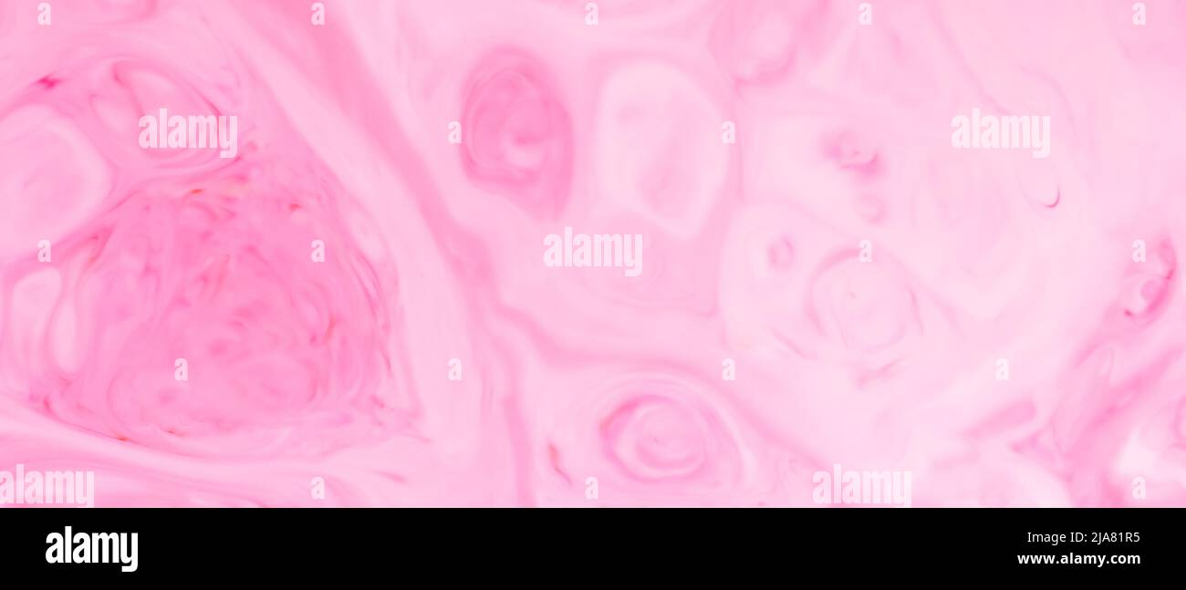 Light pink fluid art background. Blurred pink shapes on a liquid ...