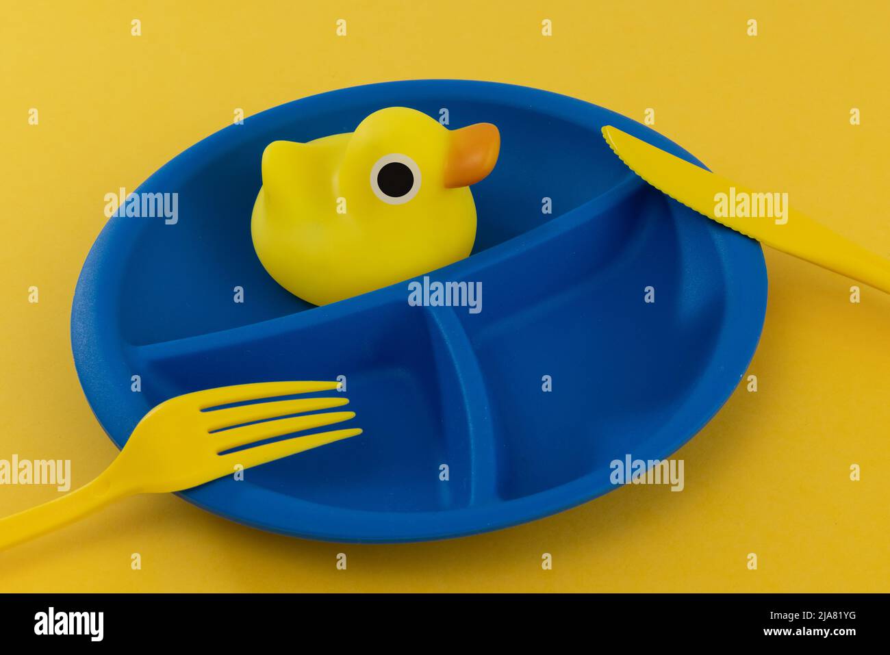Rubber duckling on a plate Stock Photo - Alamy