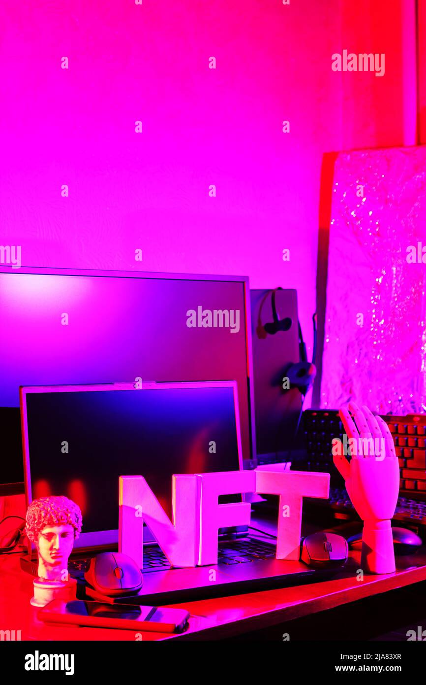 NFT (Non-Fungible Token) and artificial arm. NFT inscription and ...