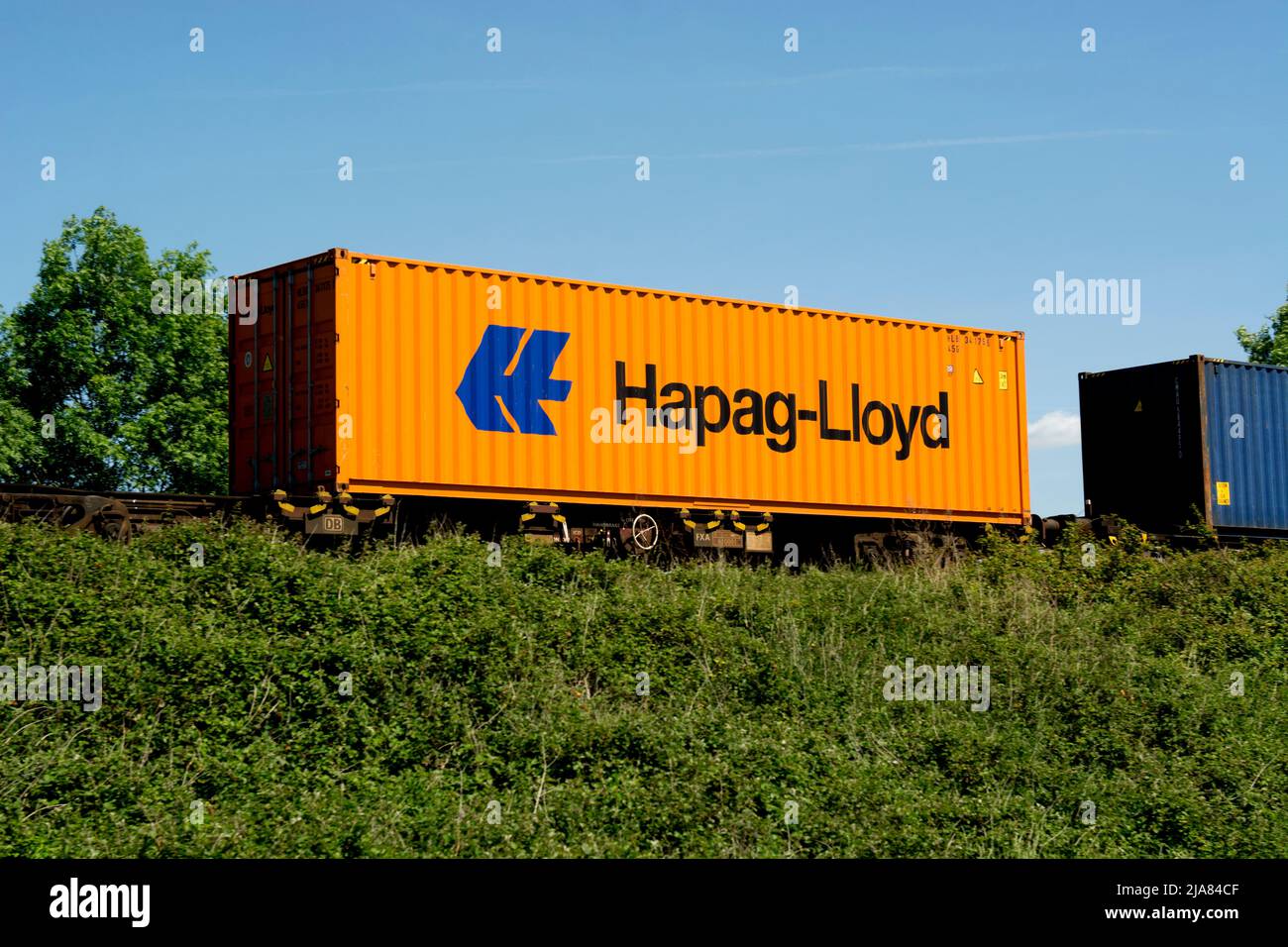 A Hapag-Lloyd shipping container on a freightliner train, Warwickshire, UK Stock Photo - Alamy