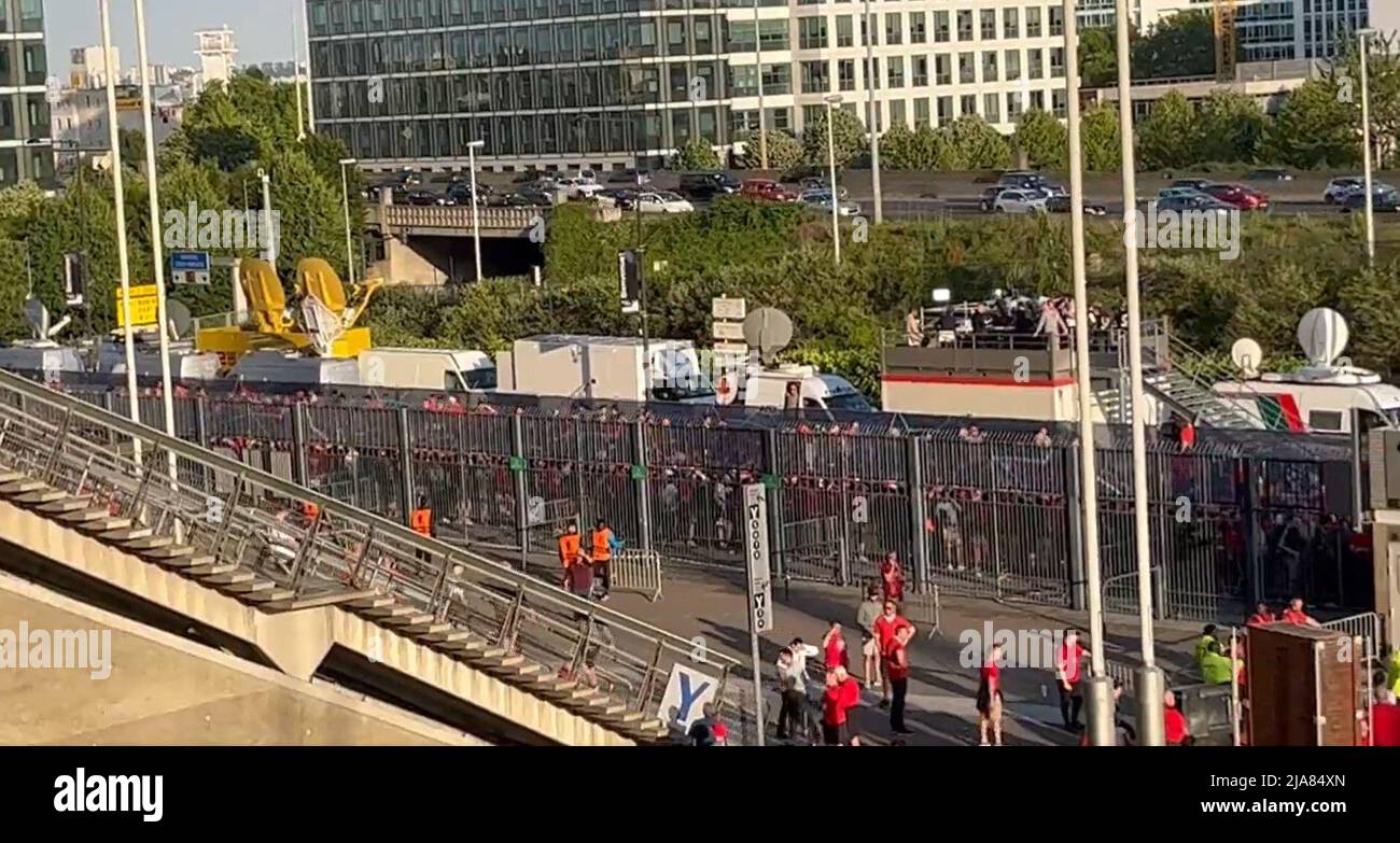 Fans waiting outside the gates to enter the stadium before the UEFA ...