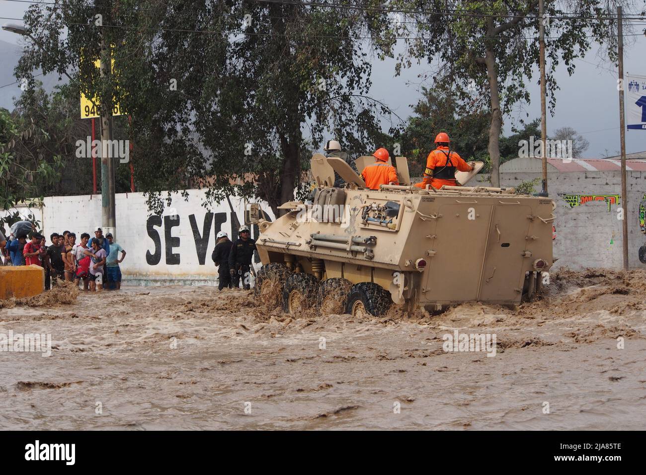 Peruvian Marines, using amphibious vehicles (ASLAV-II), rescue victims ...
