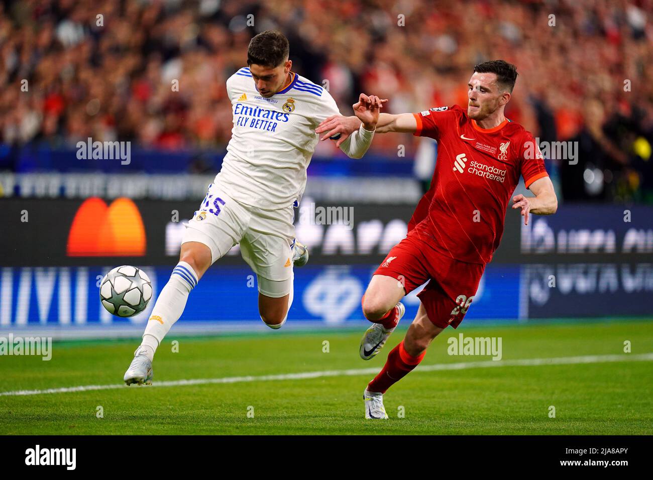Real Madrid's Federico Valverde (left) and Liverpool's Andrew Robertson ...