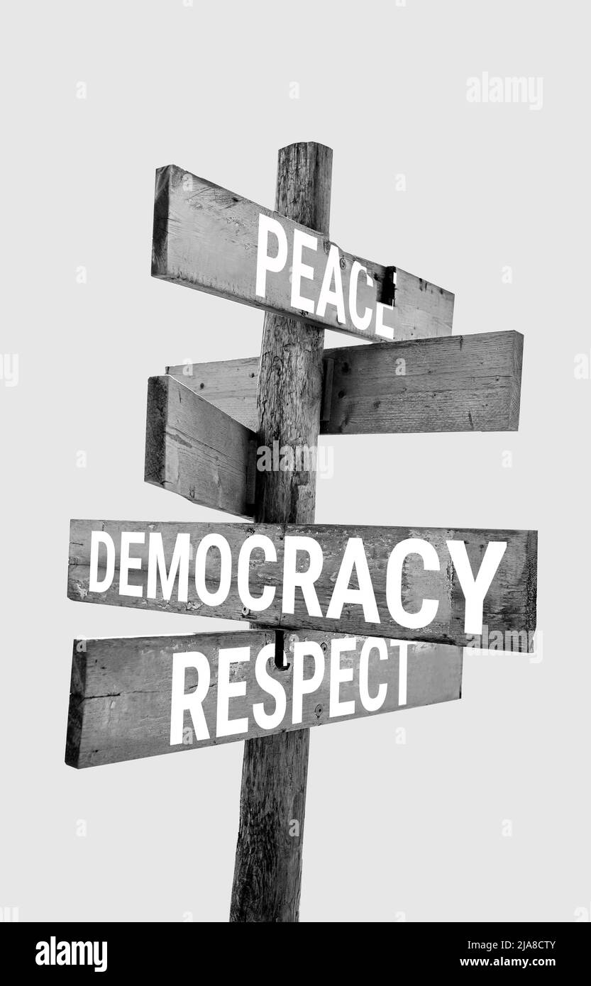 Wooden road sign with words peace, democracy, respect Stock Photo - Alamy