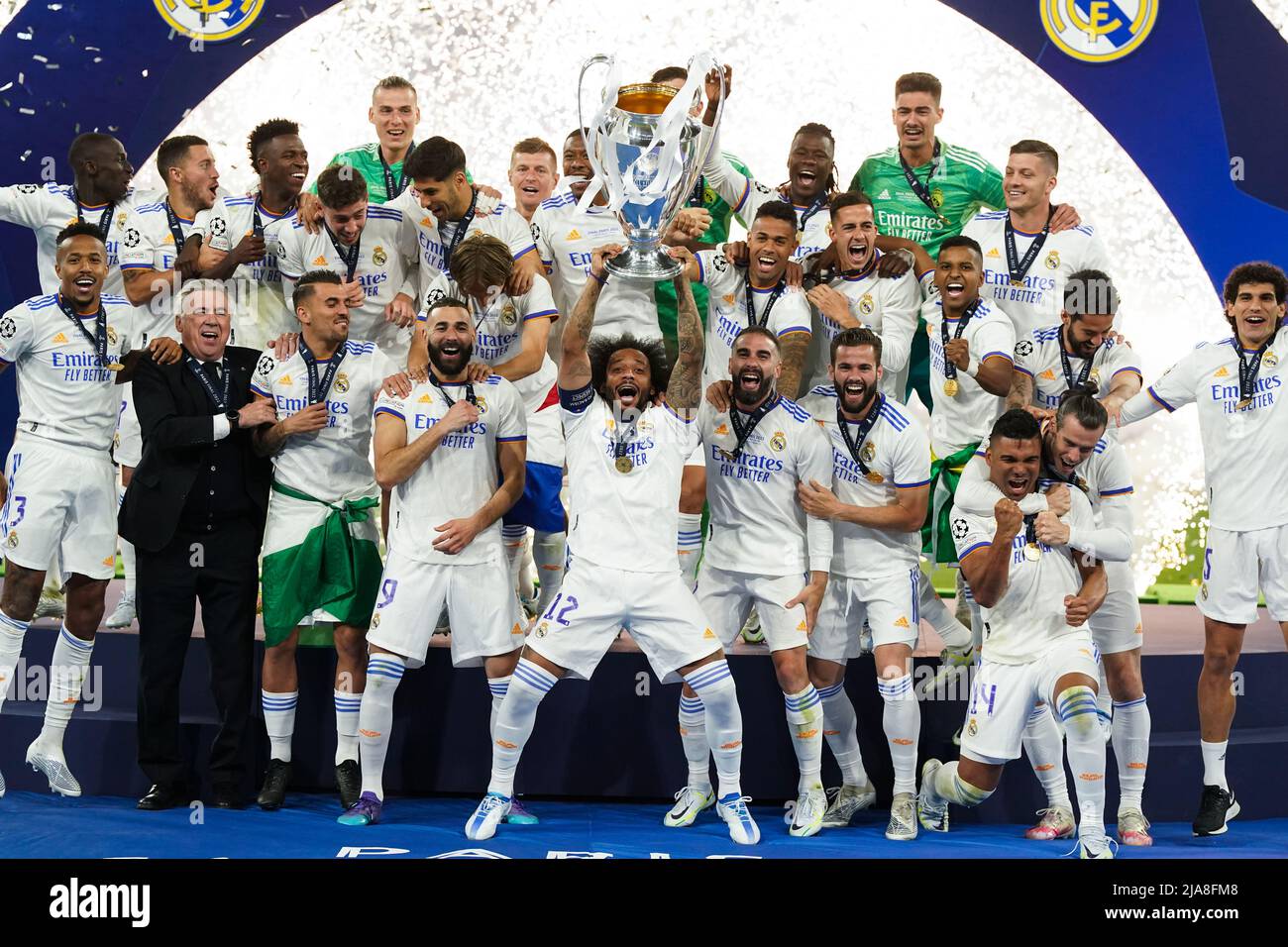 Real Madrid's Marcelo lifts the trophy as they celebrate winning the ...
