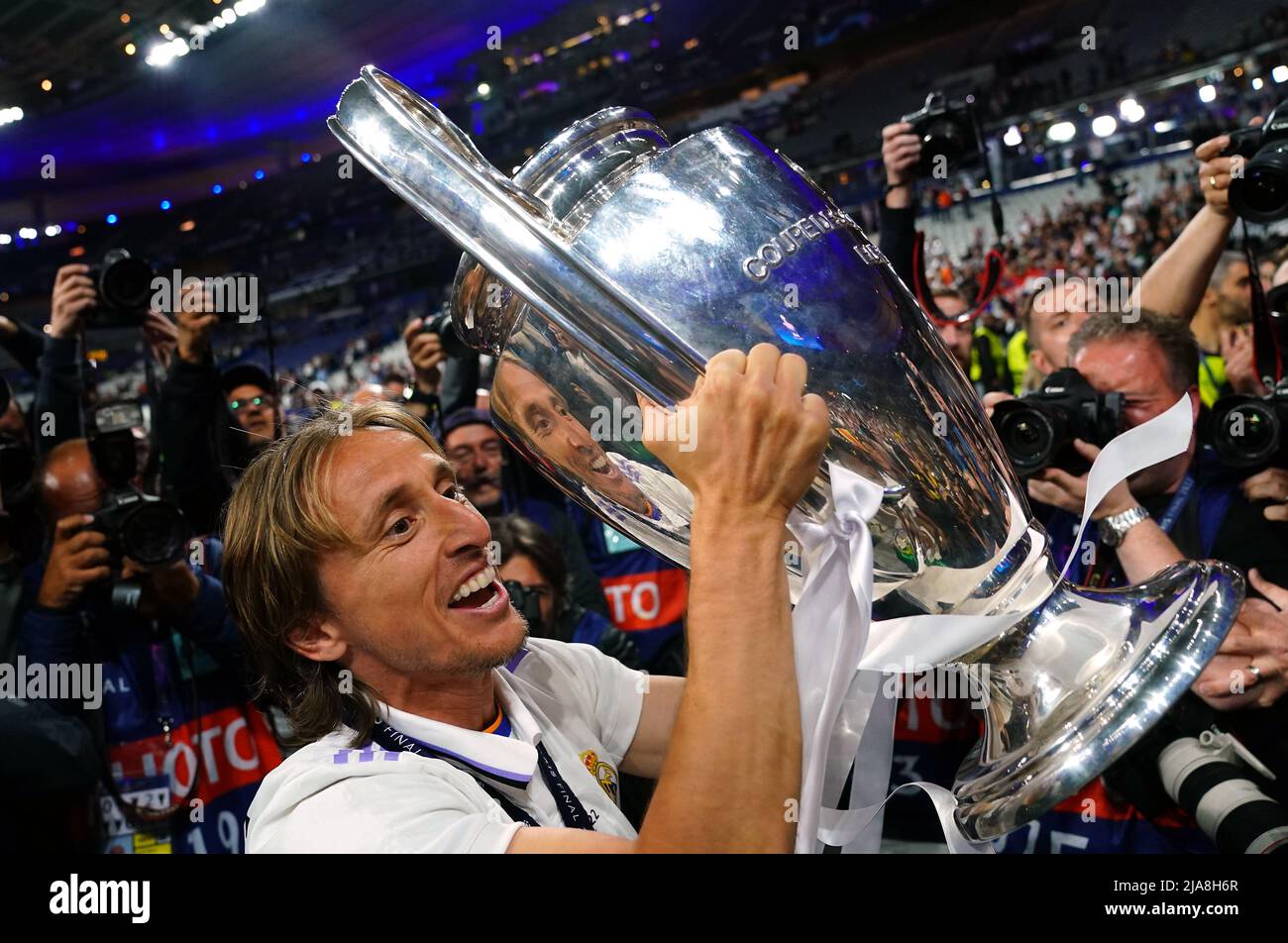 Real Madrid's Luka Modric celebrates with the trophy after winning the ...