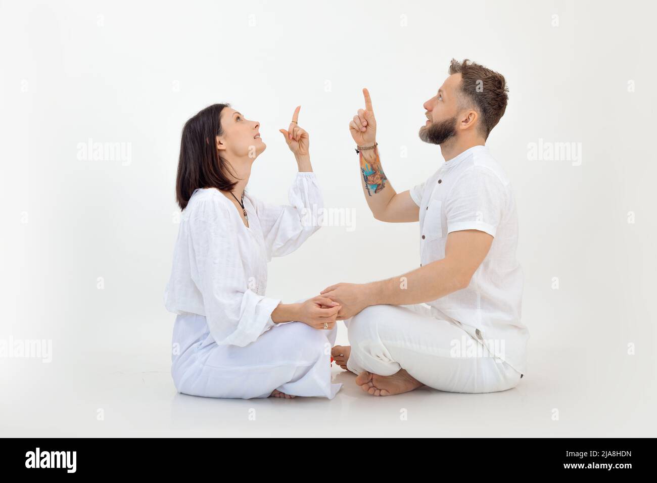 Couple in lotus position hi-res stock photography and images - Alamy