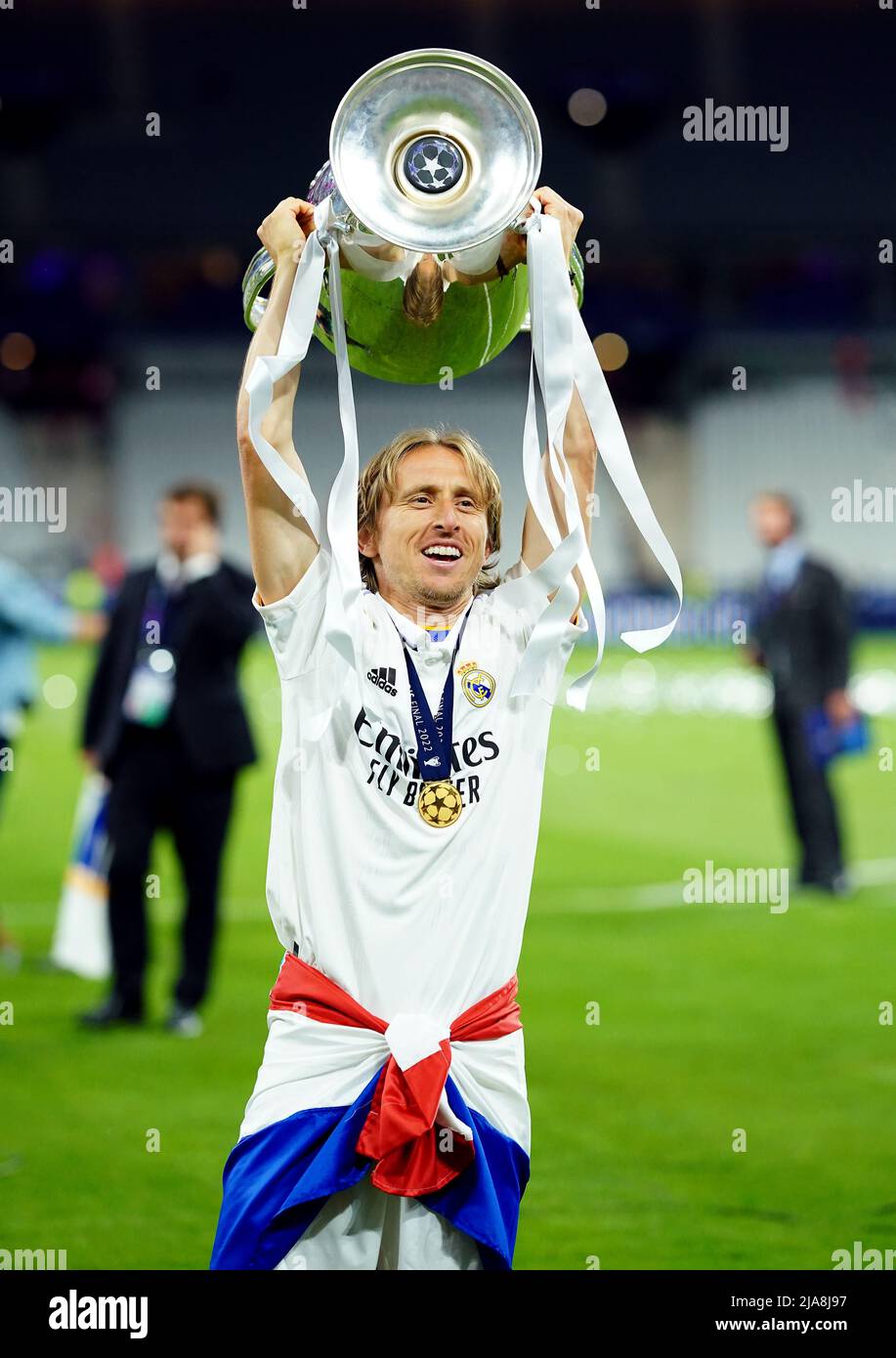 Real Madrid's Luka Modric celebrates with the trophy after winning the ...