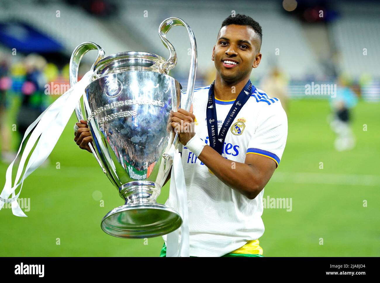 Real Madrid's Rodrygo celebrates with the trophy after victory against ...
