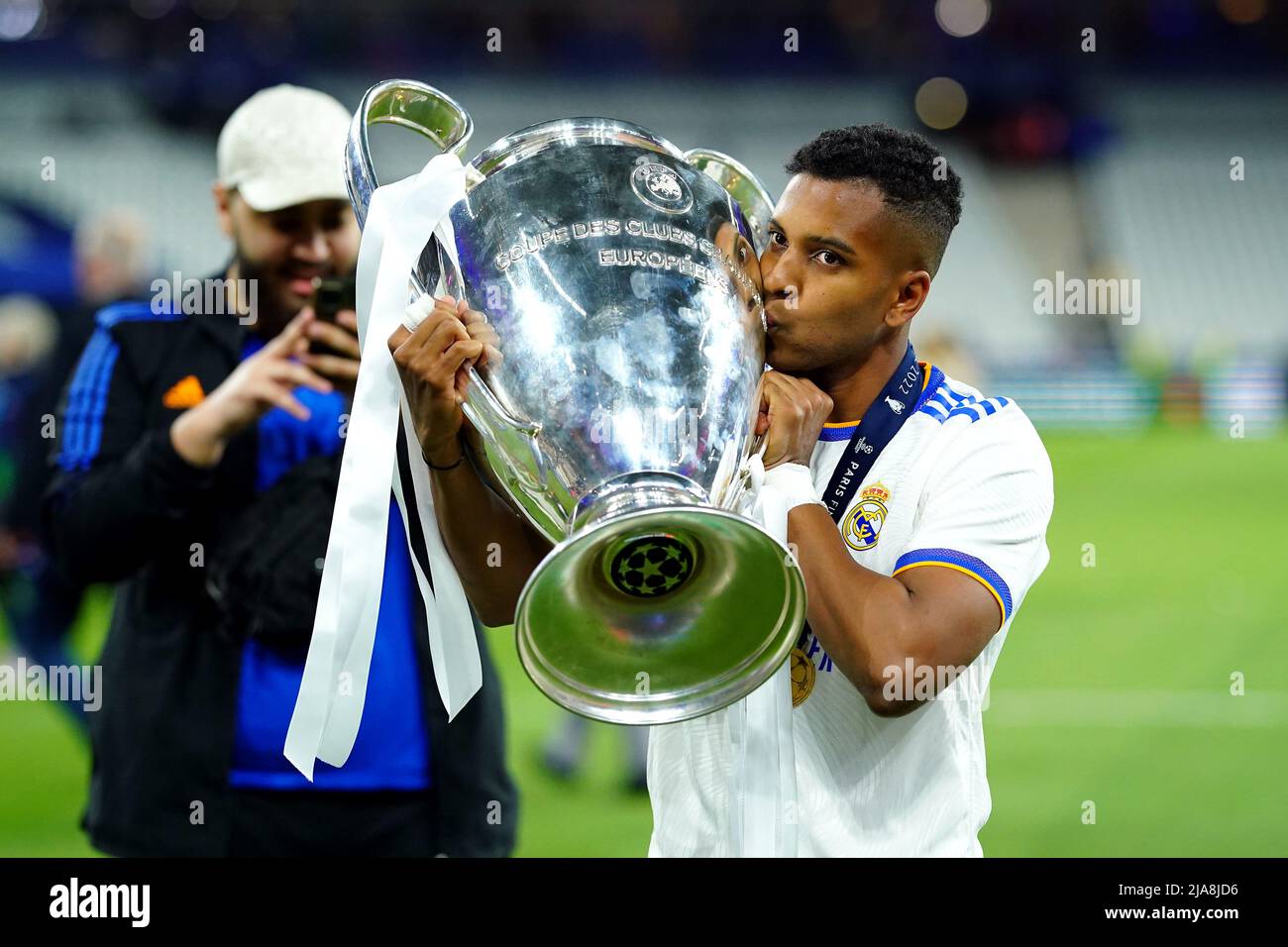 Real Madrid's Rodrygo celebrates with the trophy after victory against ...
