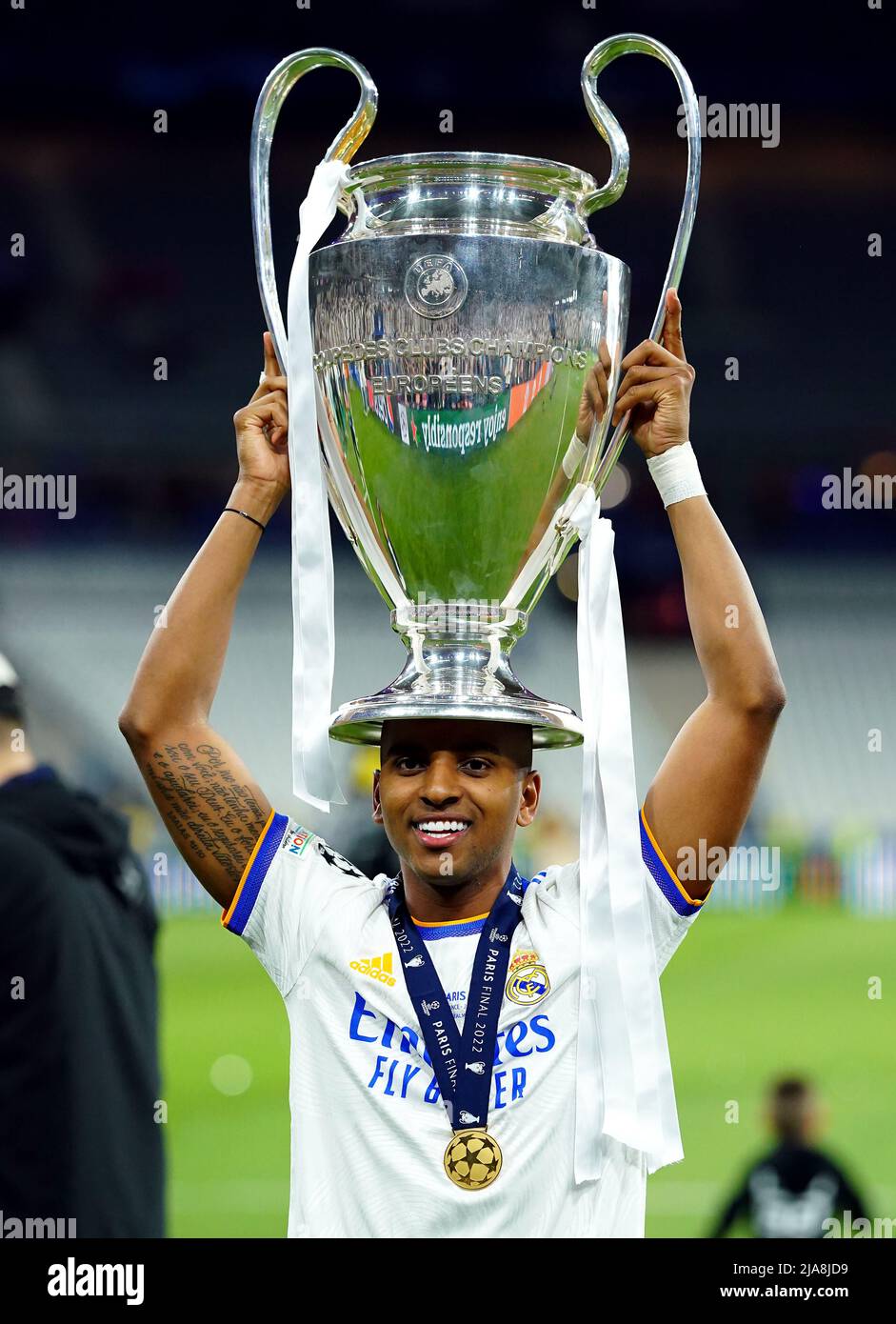 Real Madrid's Rodrygo celebrates with the trophy after victory against ...