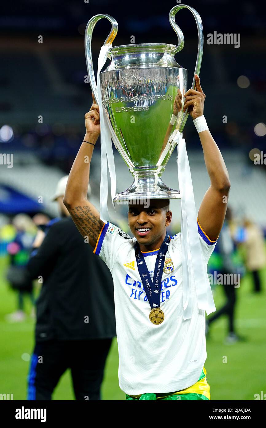 Real Madrid's Rodrygo celebrates with the trophy after victory against ...