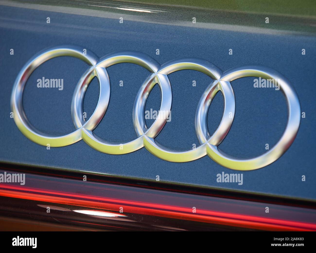 Bucharest, Romania - May 20, 2020: The logo of a blue Audi e-tron ...