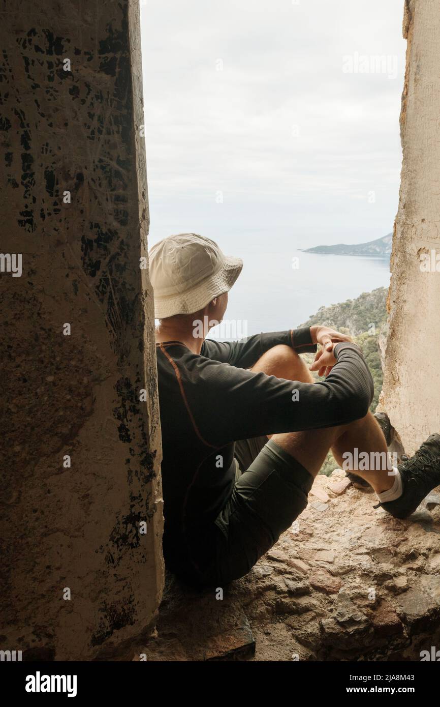 Tourist resting on ruins on the Lycian Trail, Turkey Stock Photo - Alamy