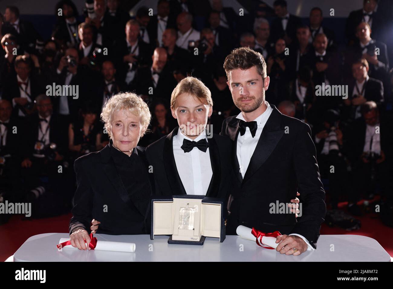 Lukas Dhont and Eden Dambrine pose with the Grand Prize Palm d'Or Award ...