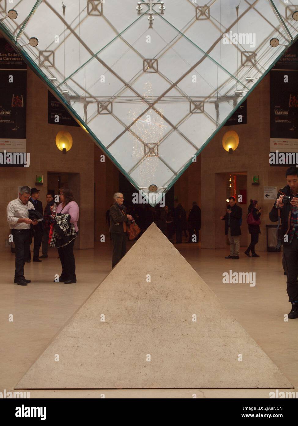 Inside view of the inverted crystal pyramid at Louvre museum Stock ...