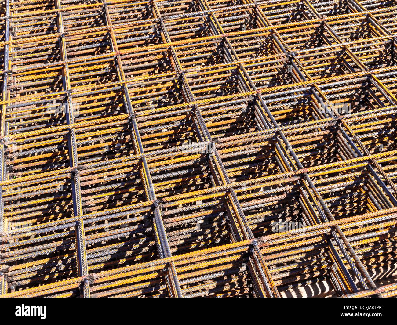 frame mesh made of steel reinforcement rusted from atmospheric ...