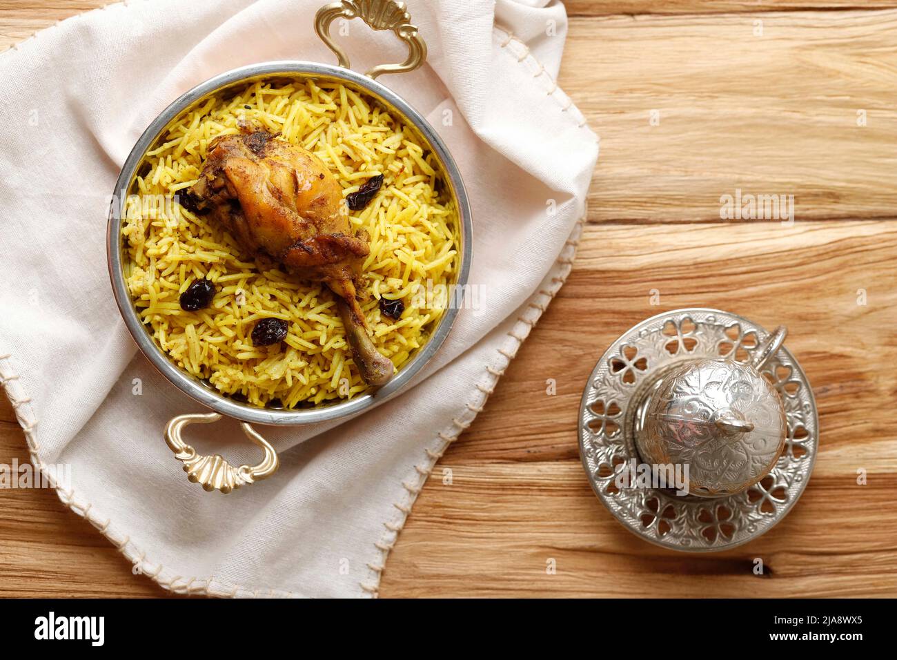 Biryani with Spiced Chiken and Raisin, Served on Turlish Chopper Pan ...