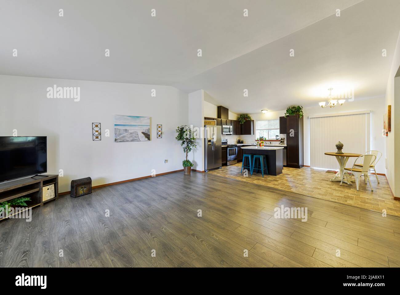 Modern residential empty living room, dining room and kitchen interior ...