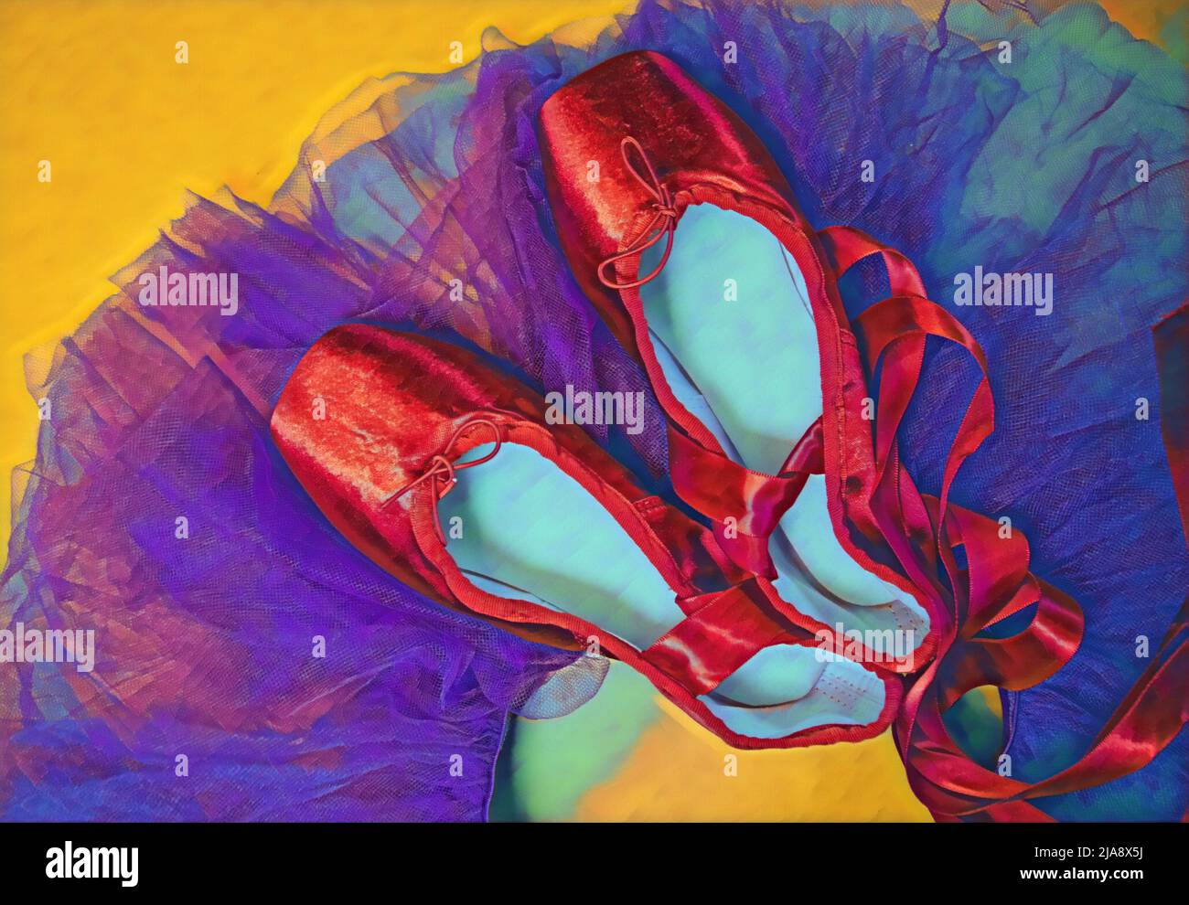 Red ballet pointe shoes set on top of a purple tutu, and a yellow ...