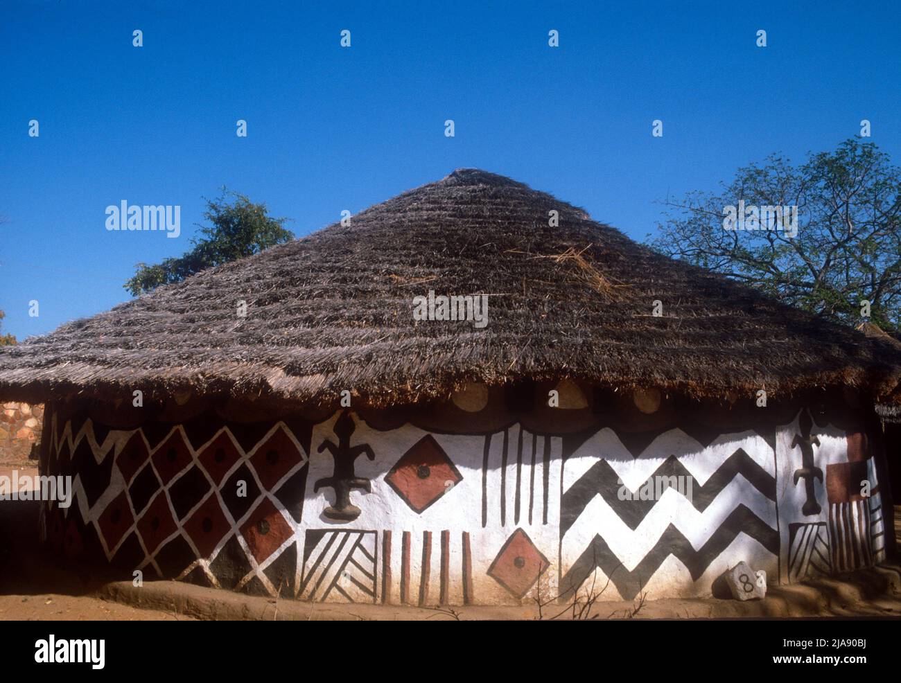 A Venda chief's hut in a tribal village in south-west Zimbabwe, 1984 ...