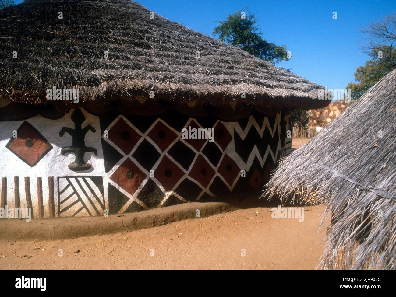 Highly decorated hut of a Venda chief in Zimbabwe, 1984 Stock Photo - Alamy