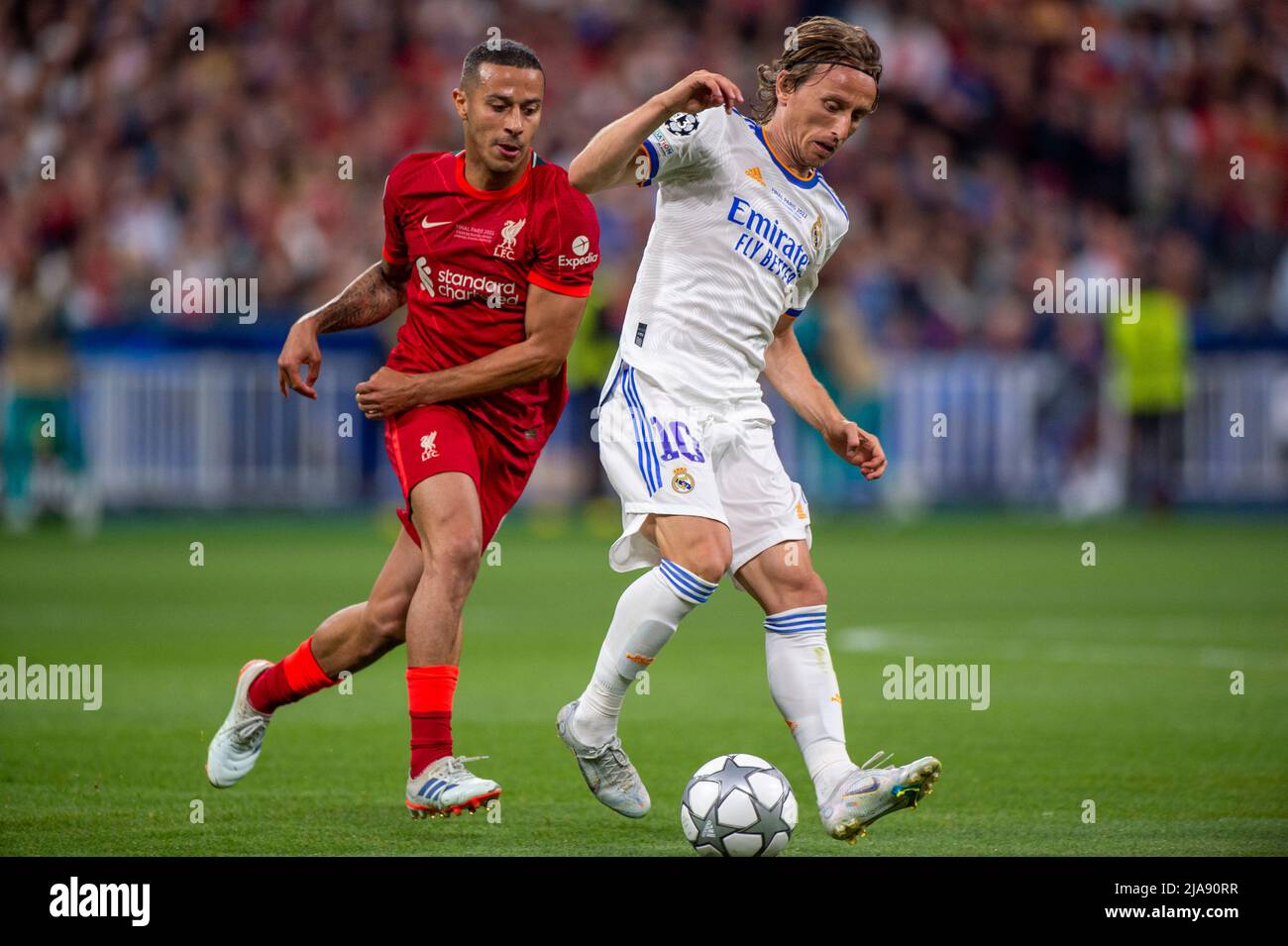 Luka Modric of Real and Thiago Alcantara of Liverpool fight for the ...