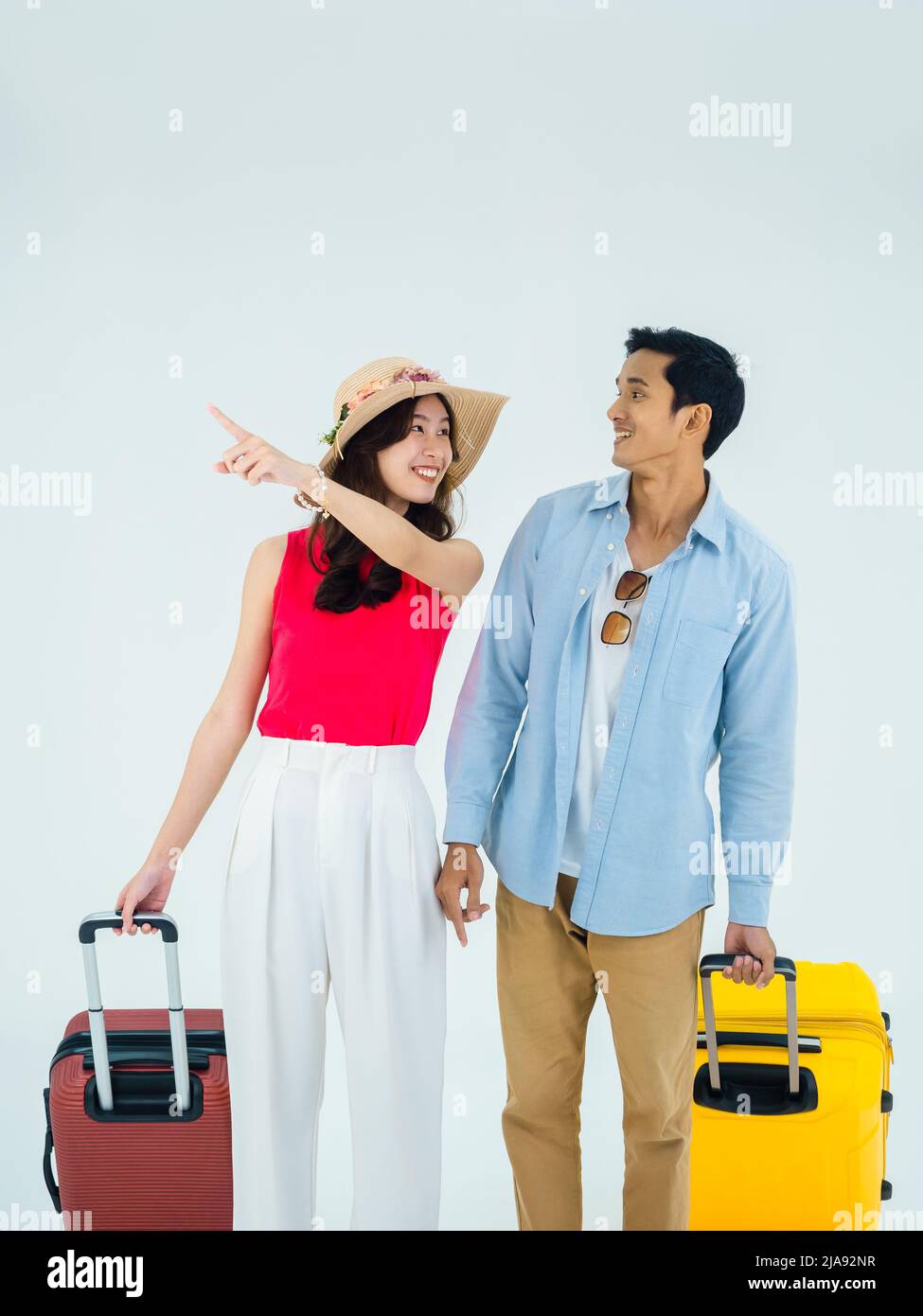 Exciting travel, happy holiday. Summer vacation. Asian couple travelers ...