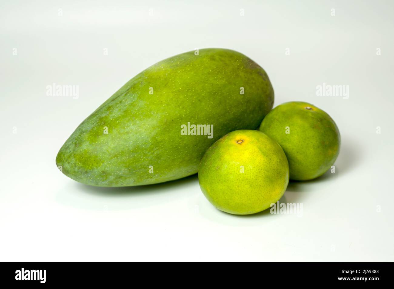 Mango and orange fruit isolated on white background package design ...