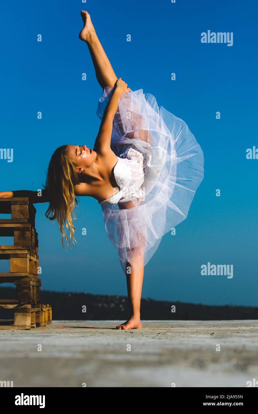 Art ballet. Young ballerina, ballet dancer. Leg-split, flexible girl ...