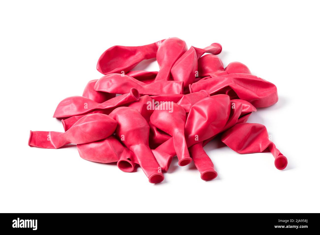 Red baby not inflated rubber balloons isolated on white Stock Photo - Alamy
