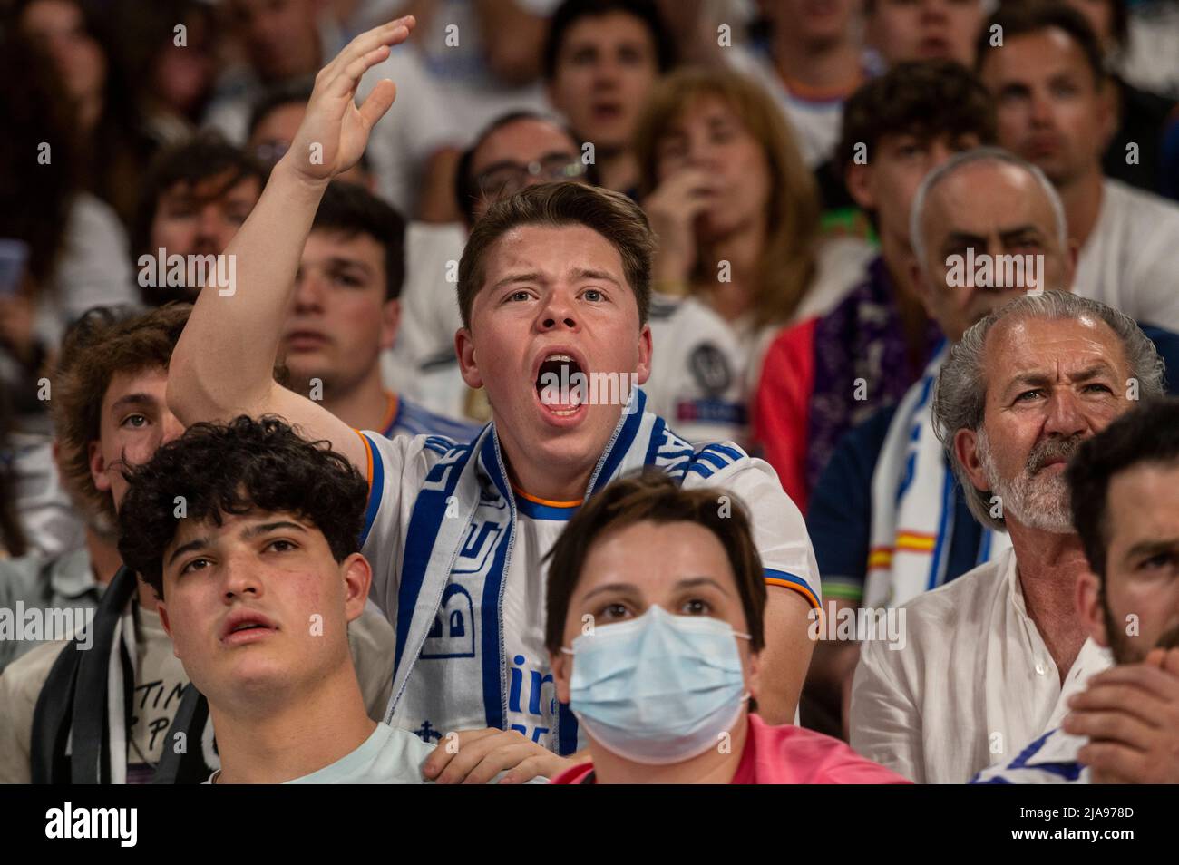Madrid, Spain. 29th May, 2022. A Real Madrid fan chants slogans while ...