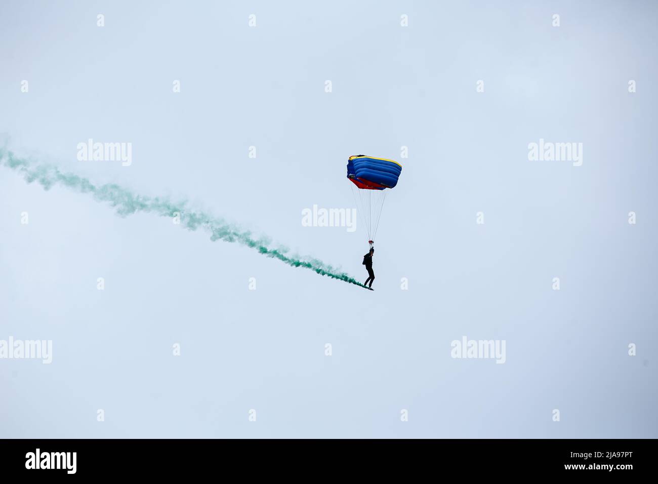 A Kenyan civilian skydiving team entertain the public with a parachute ...