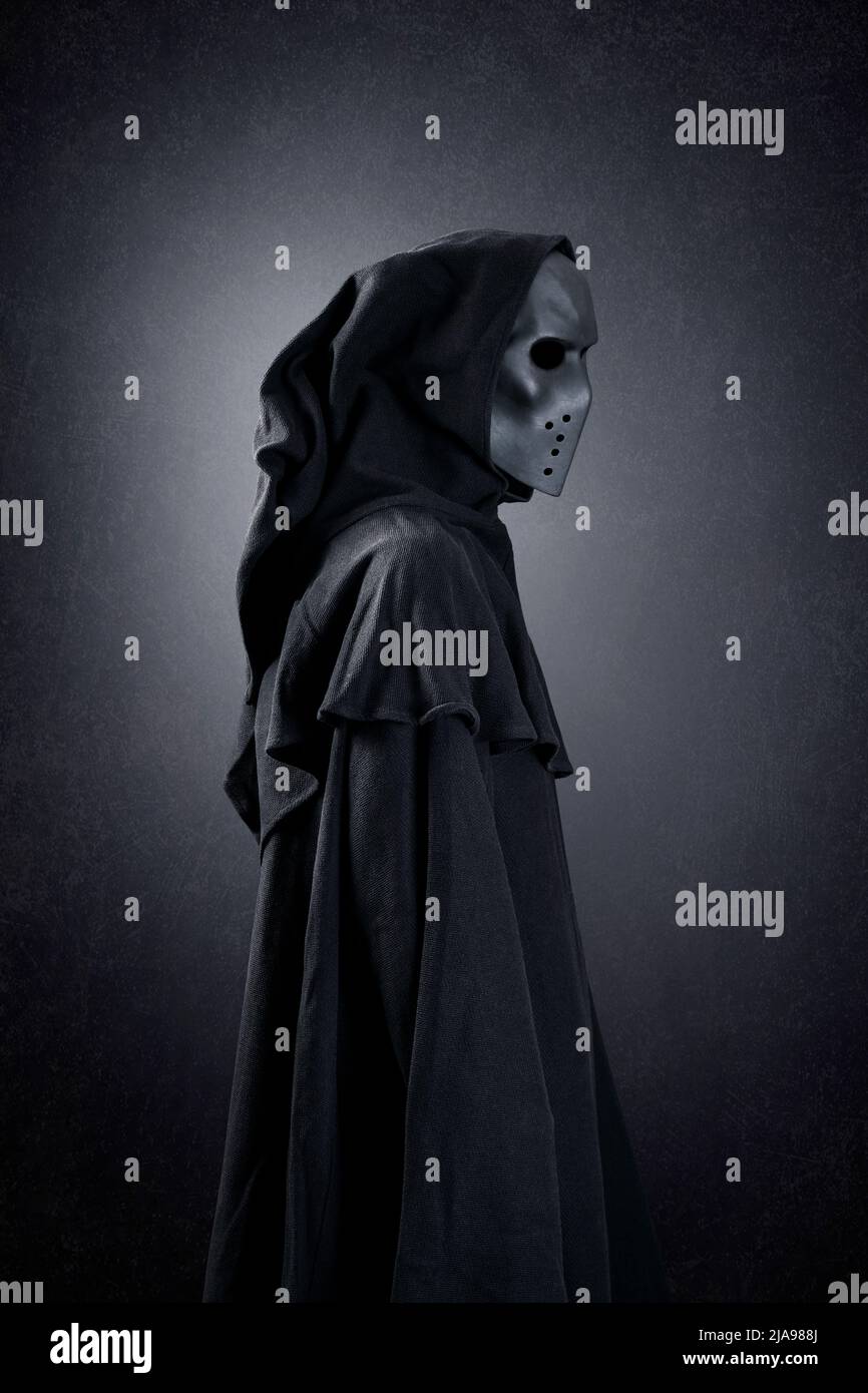 Mysterious humanoid alien at night over dark misty background Stock ...
