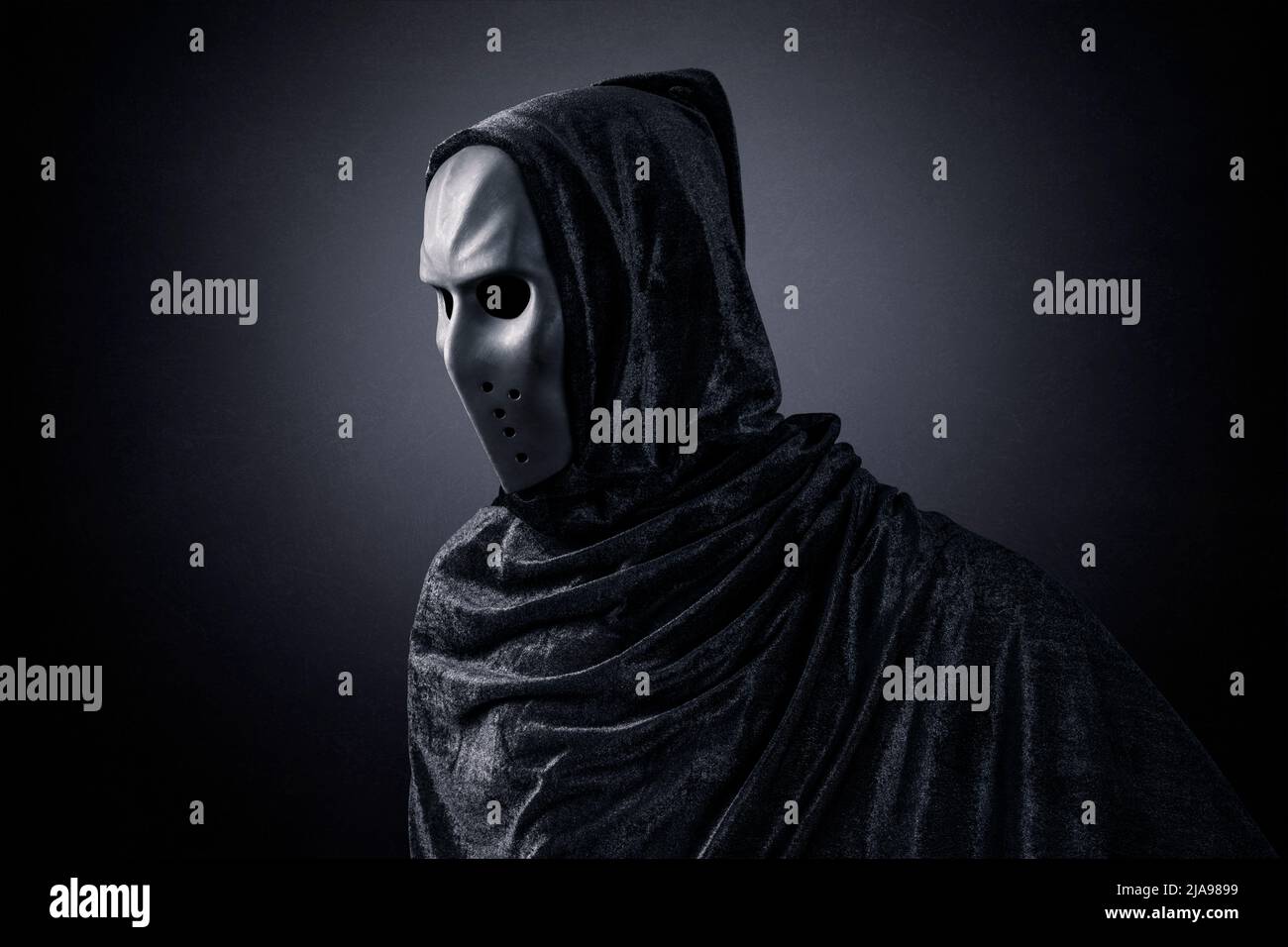Mysterious humanoid alien at night over dark misty background Stock ...