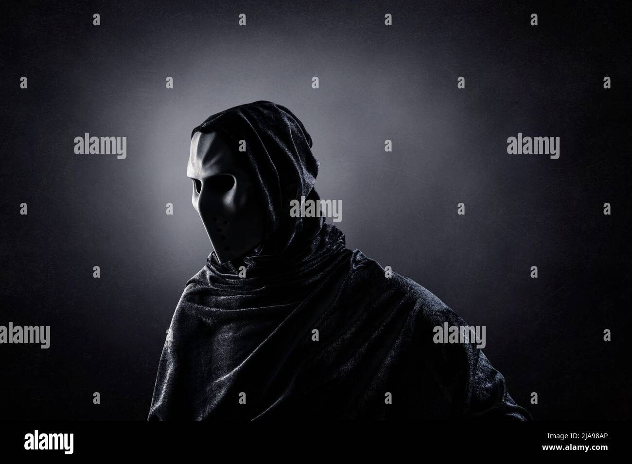 Mysterious humanoid alien at night over dark misty background Stock ...