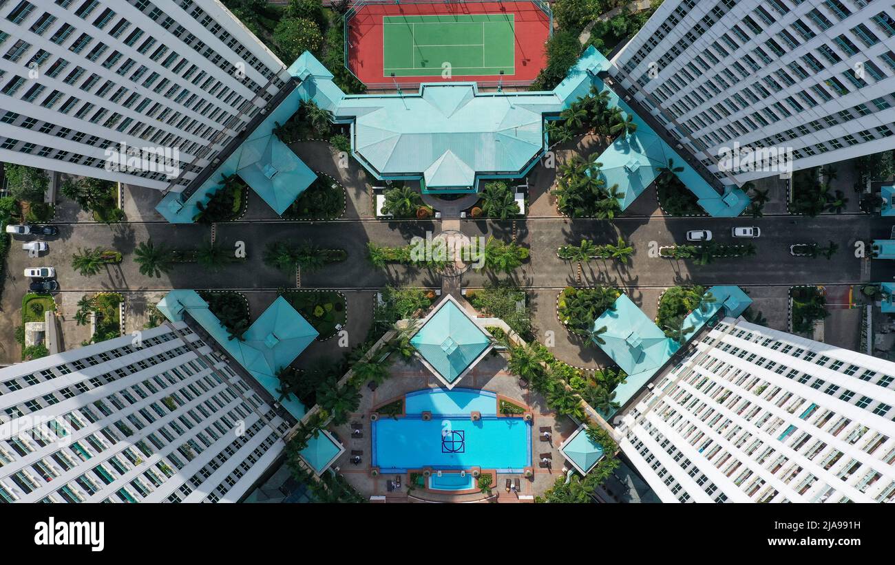 Top down view of residential apartment building in Jakarta. Birds eye ...