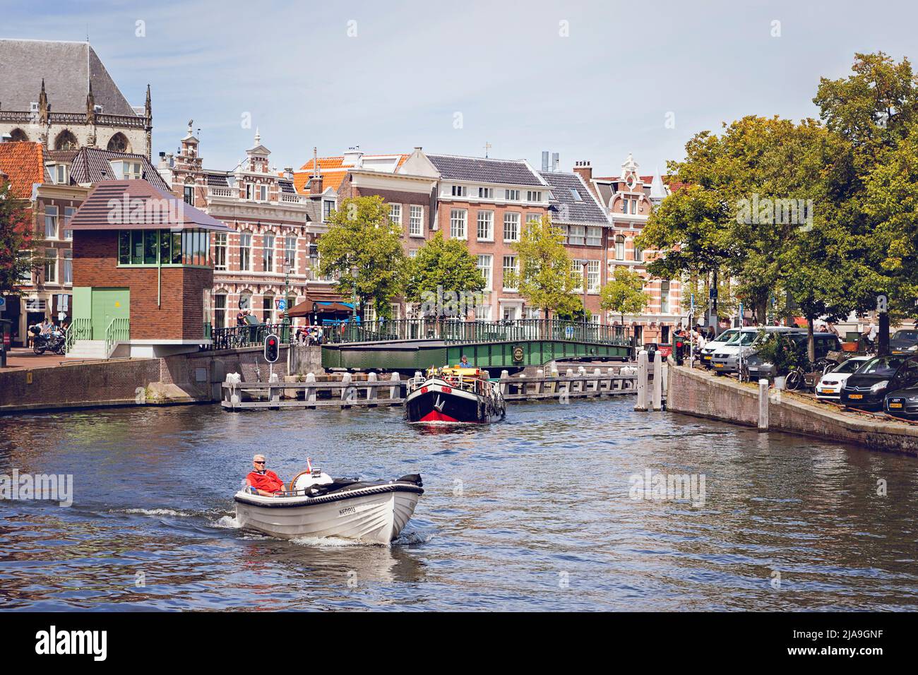 River in Utrecht with bridges boats and tall buildings Stock Photo - Alamy