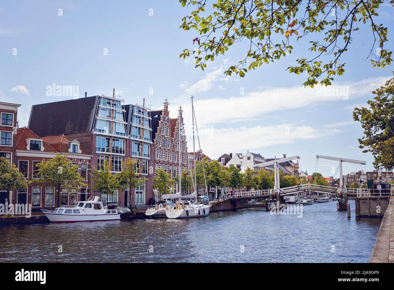 Lifting bridge. River in Utrecht with boats and tall buildings Stock ...