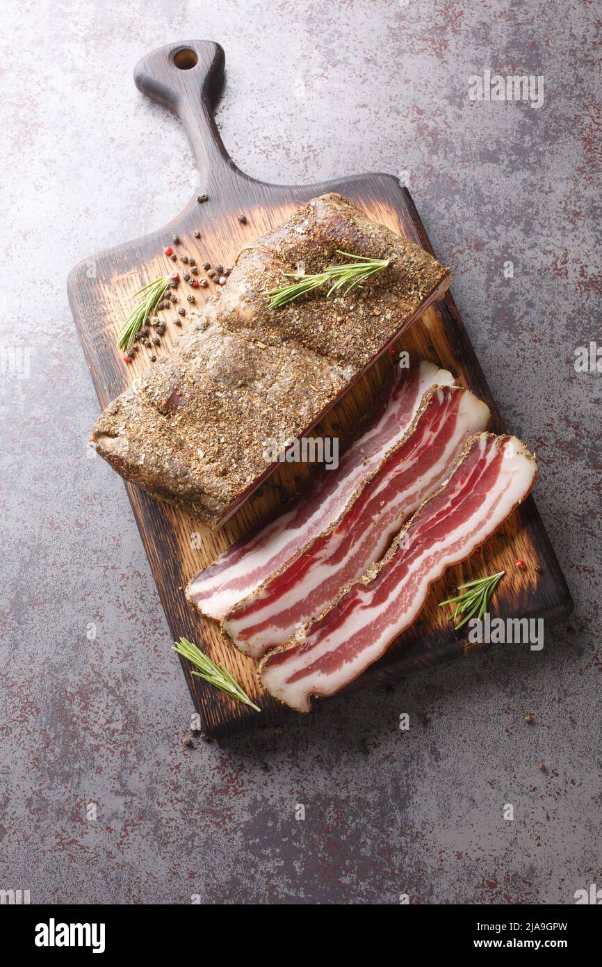 Dry cured pork belly, smoked pork meat delicacy food closeup on the ...