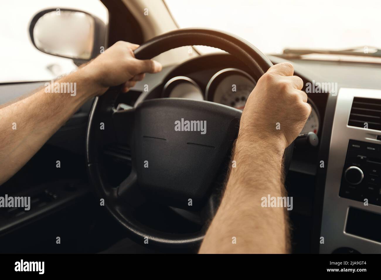 Man at the steering wheel hi-res stock photography and images - Alamy