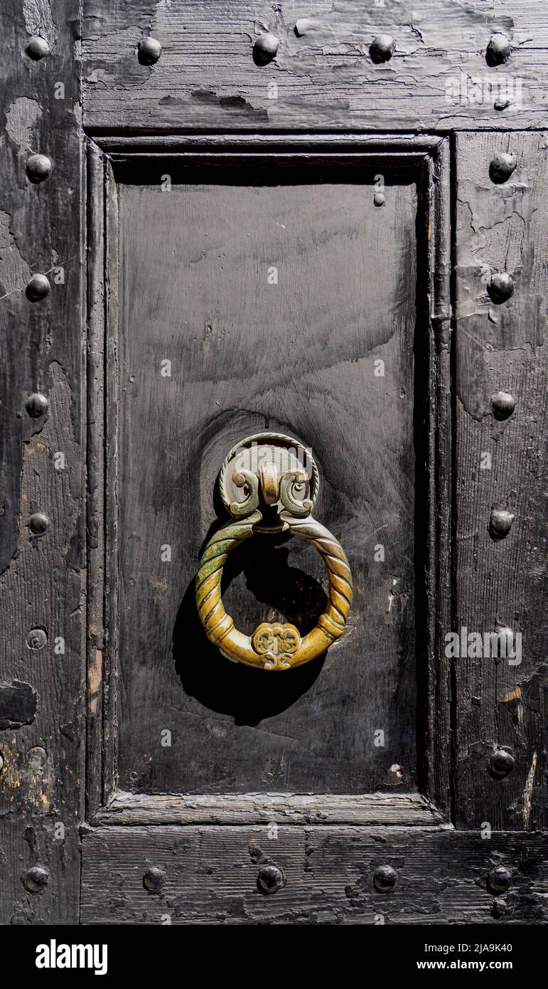 Antique golden Door handle for knocking on the door Stock Photo - Alamy