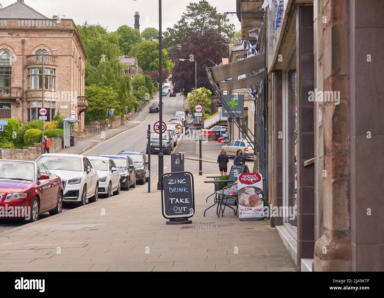 Advertising boards on a sidewalk example Stock Photo - Alamy