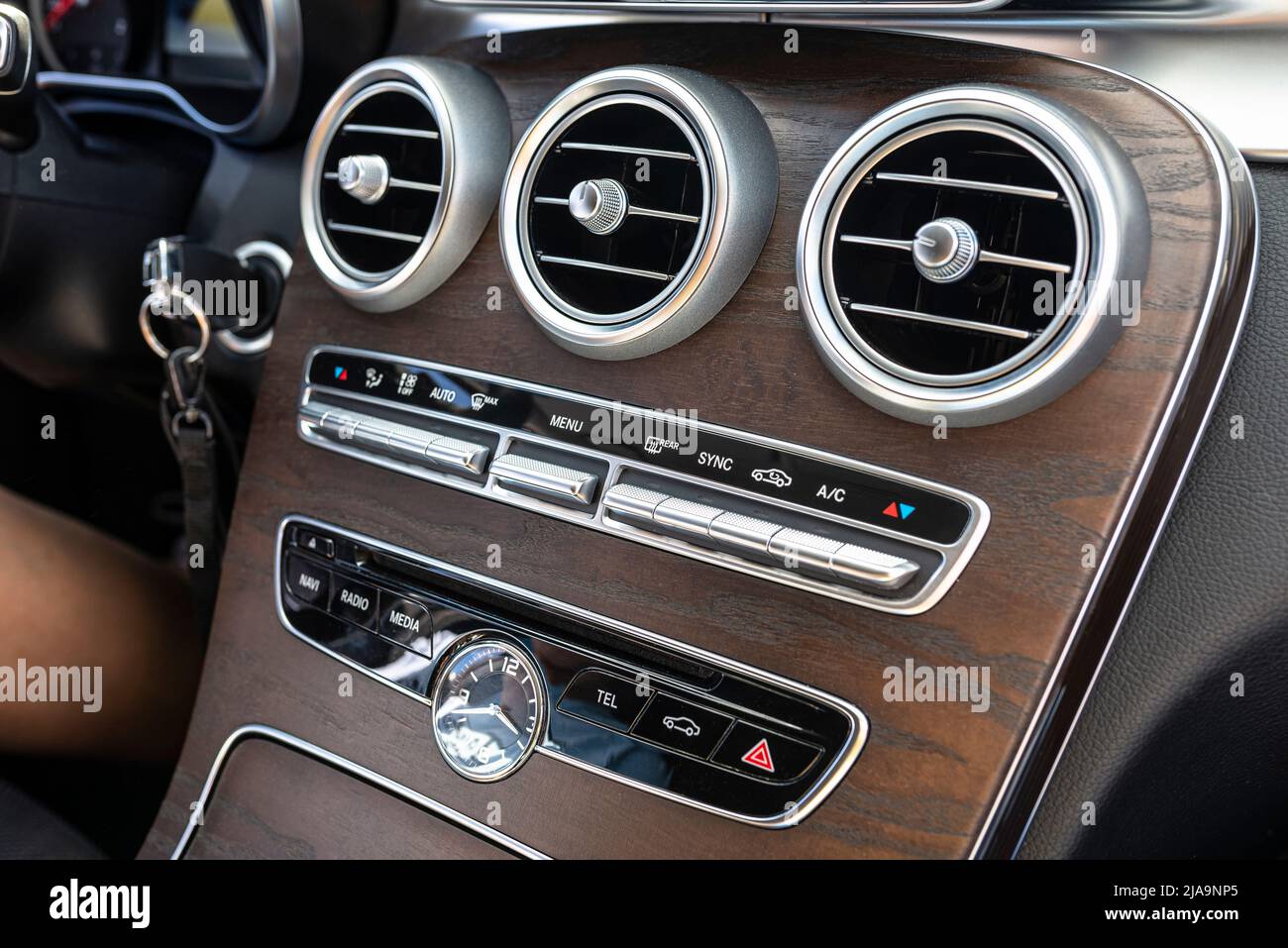 The interior of a modern passenger car with three vents visible and air ...