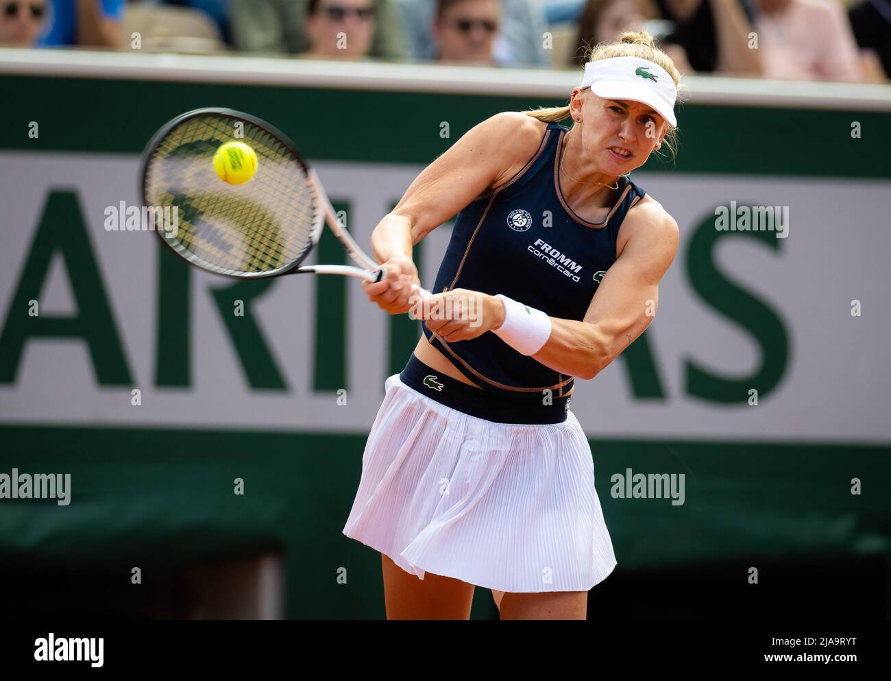 Jil Teichmann of Switzerland in action against Victoria Azarenka of ...