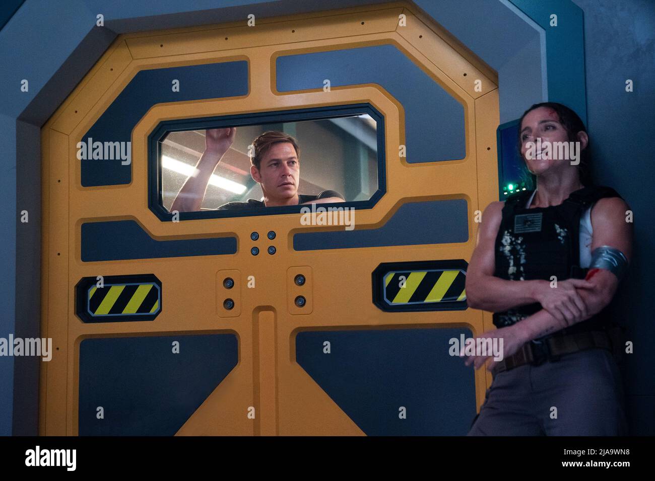 ELSA PATAKY and LUKE BRACEY in INTERCEPTOR (2022), directed by MATTHEW ...