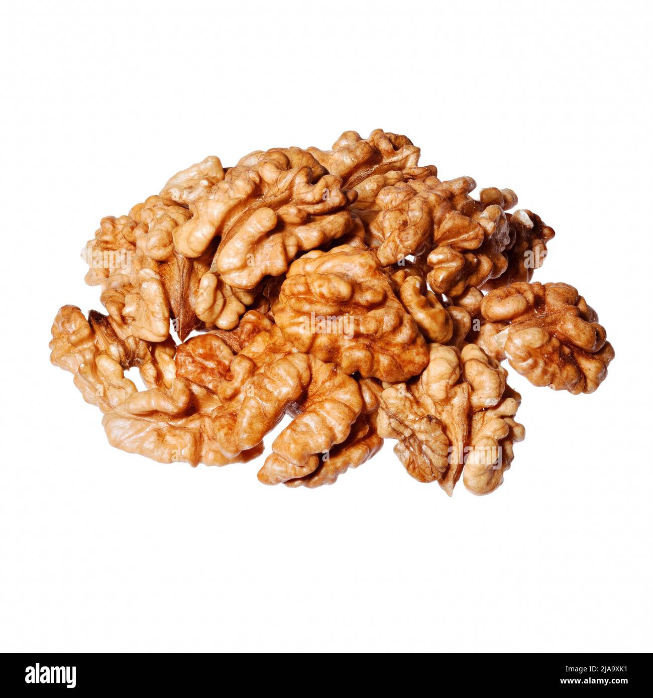 Shelled walnut close-up isolated on white background Stock Photo - Alamy