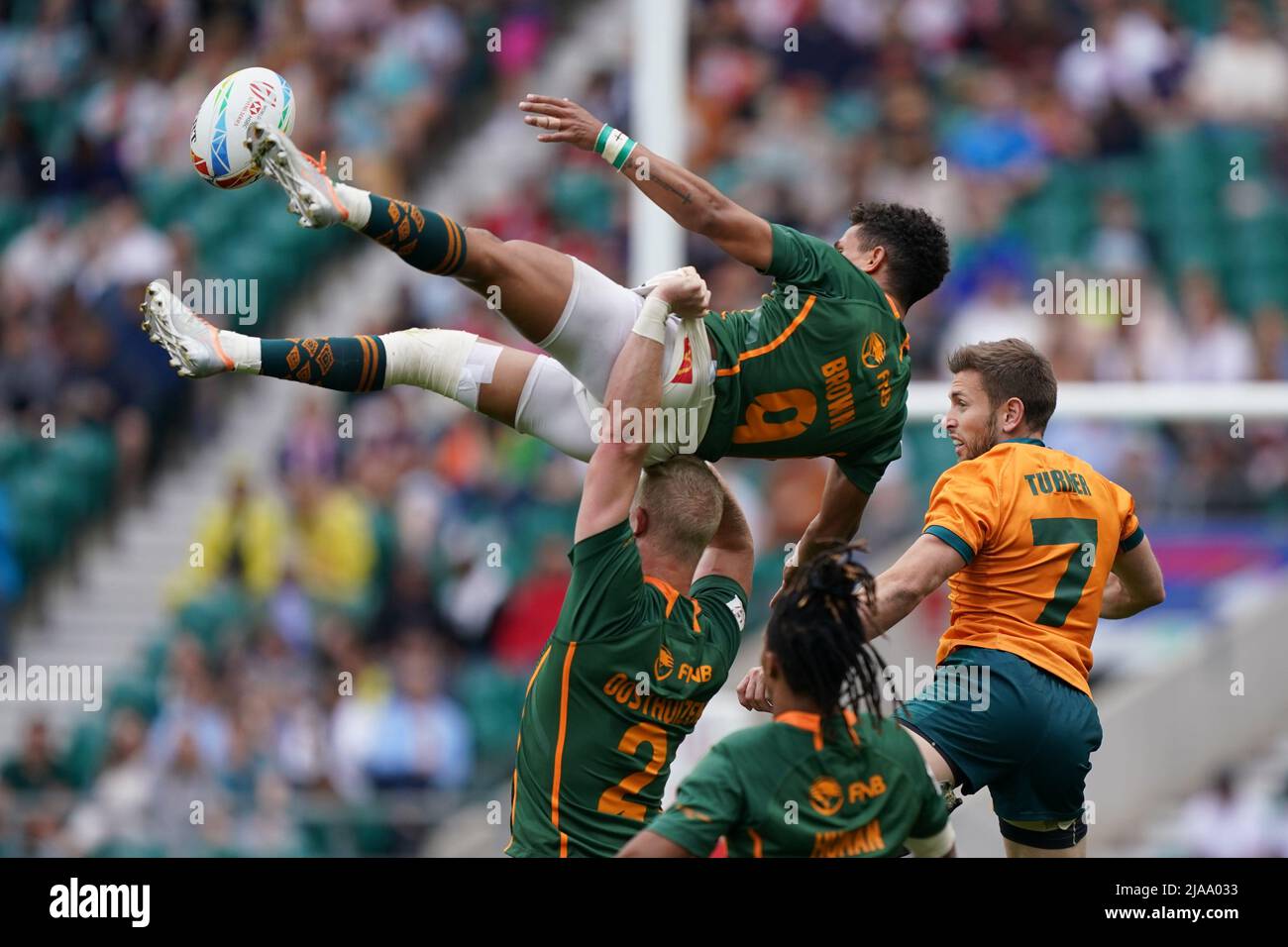 South Africa's Ronald Brown and Australia's Josh Turner during match 32 ...